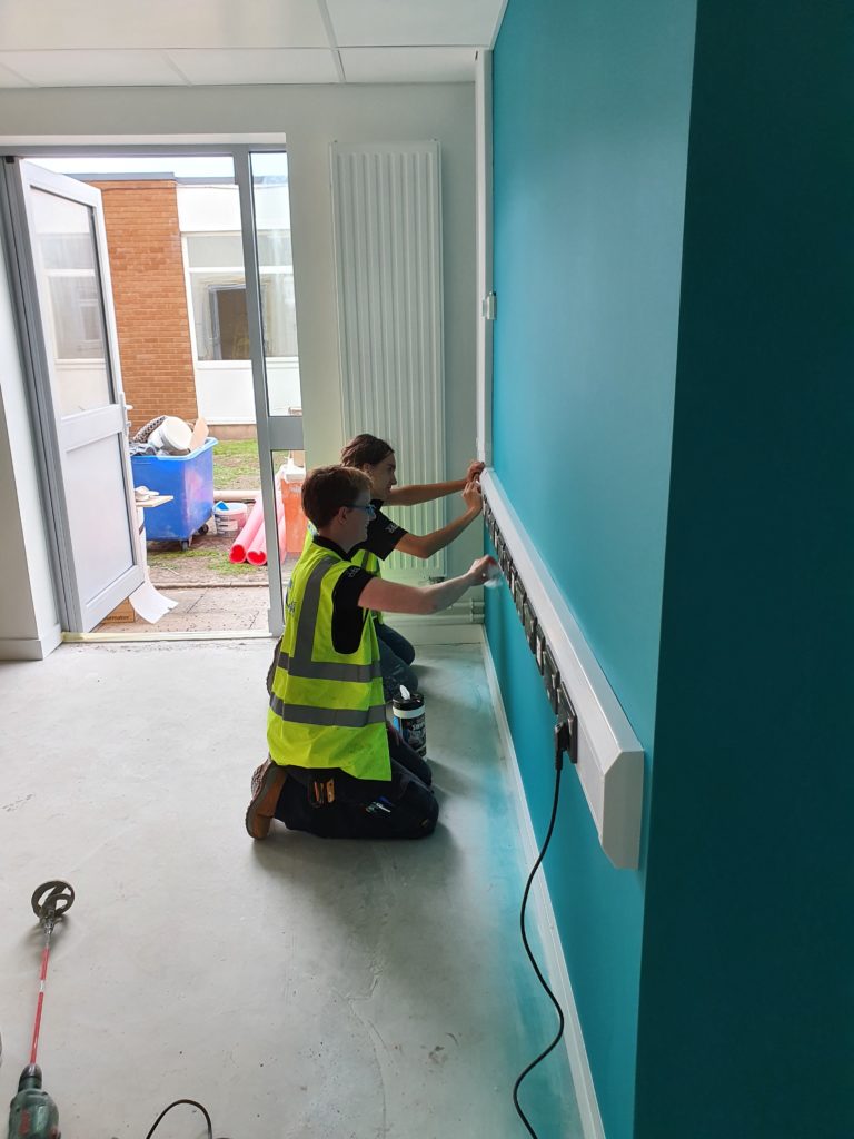 Amy Labeling up sockets - Professional Electrician